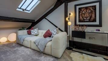 Apartamento, 2 quartos | Área de estar