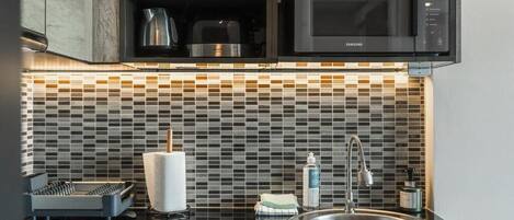 Apartamento, varanda | Cozinha privada