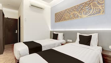 Quarto Twin Deluxe | Quartos insonorizados, Wi-fi grátis, roupa de cama fornecida