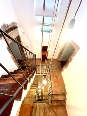 Quarto casal superior | Área de estar