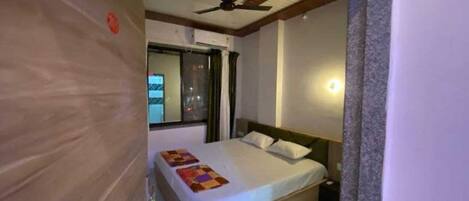 Quarto luxo | Camas extras/dobráveis (sobretaxa), Wi-Fi de cortesia, roupa de cama