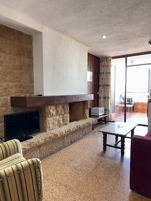 Apartamento Comfort, vista para a praia | Sala de estar