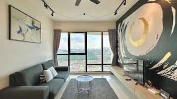 Apartamento Comfort, 2 quartos, kitchenette, Vista para a cidade | Sala de estar
