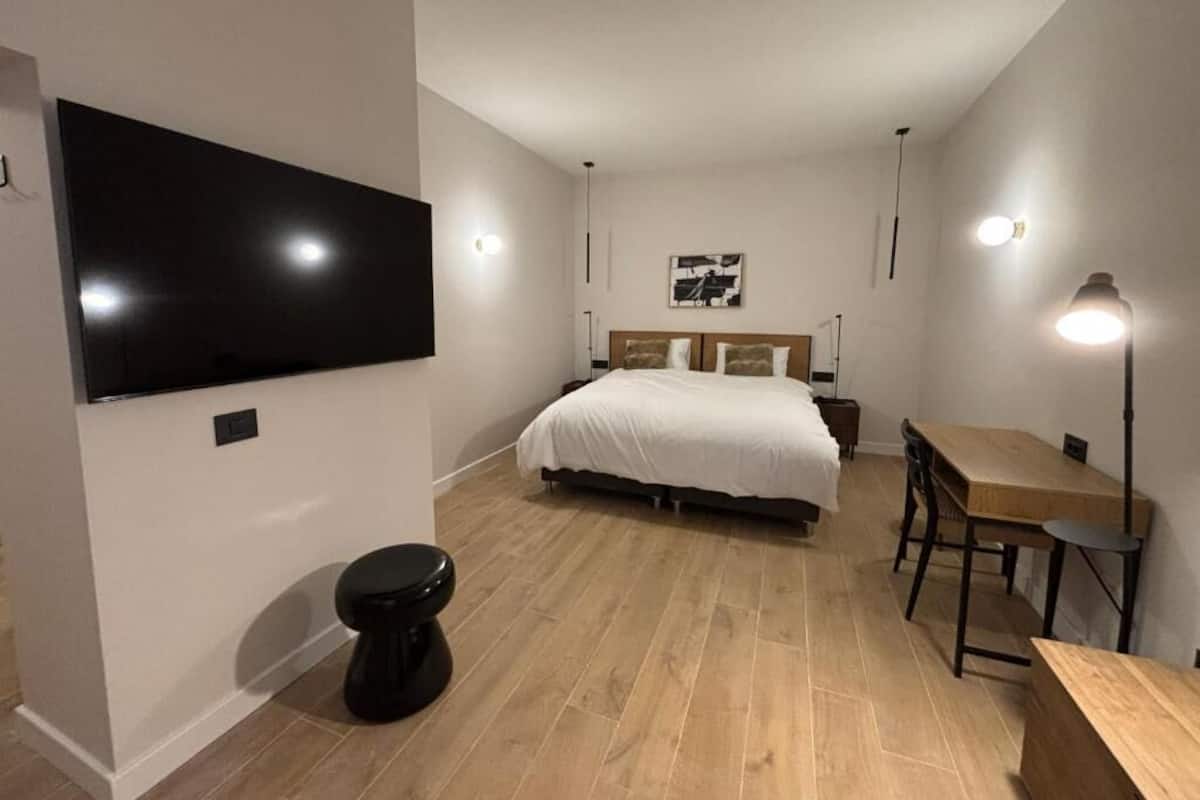 Suíte básica, varanda | Berços grátis, Wi-Fi de cortesia, roupa de cama
