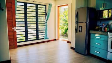 Estúdio, varanda, vista para o jardim | Cozinha privada