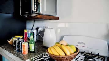 Estúdio, varanda, vista para o jardim | Cozinha privada