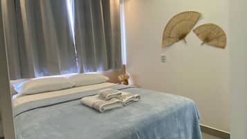 Apartamento | Cortinas/cortinados opacos, ferro/tábua de engomar, Wi-fi grátis