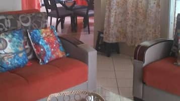 Quarto Duplo Deluxe, varanda | Sala de estar