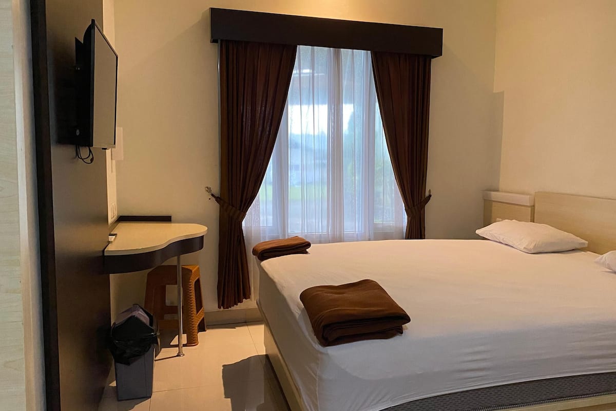 Quarto casal luxo, vista para o jardim | Wi-Fi de cortesia