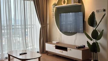 Apartamento, 2 quartos | Área de estar