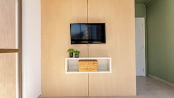 Quarto Triplo Superior, Vista para a cidade | Sala de estar