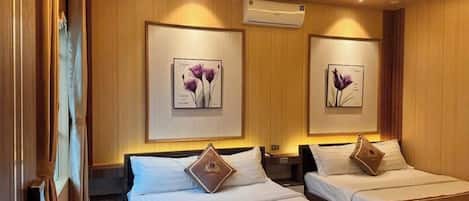 Quarto Quádruplo Básico, vista para o jardim | Wi-fi grátis
