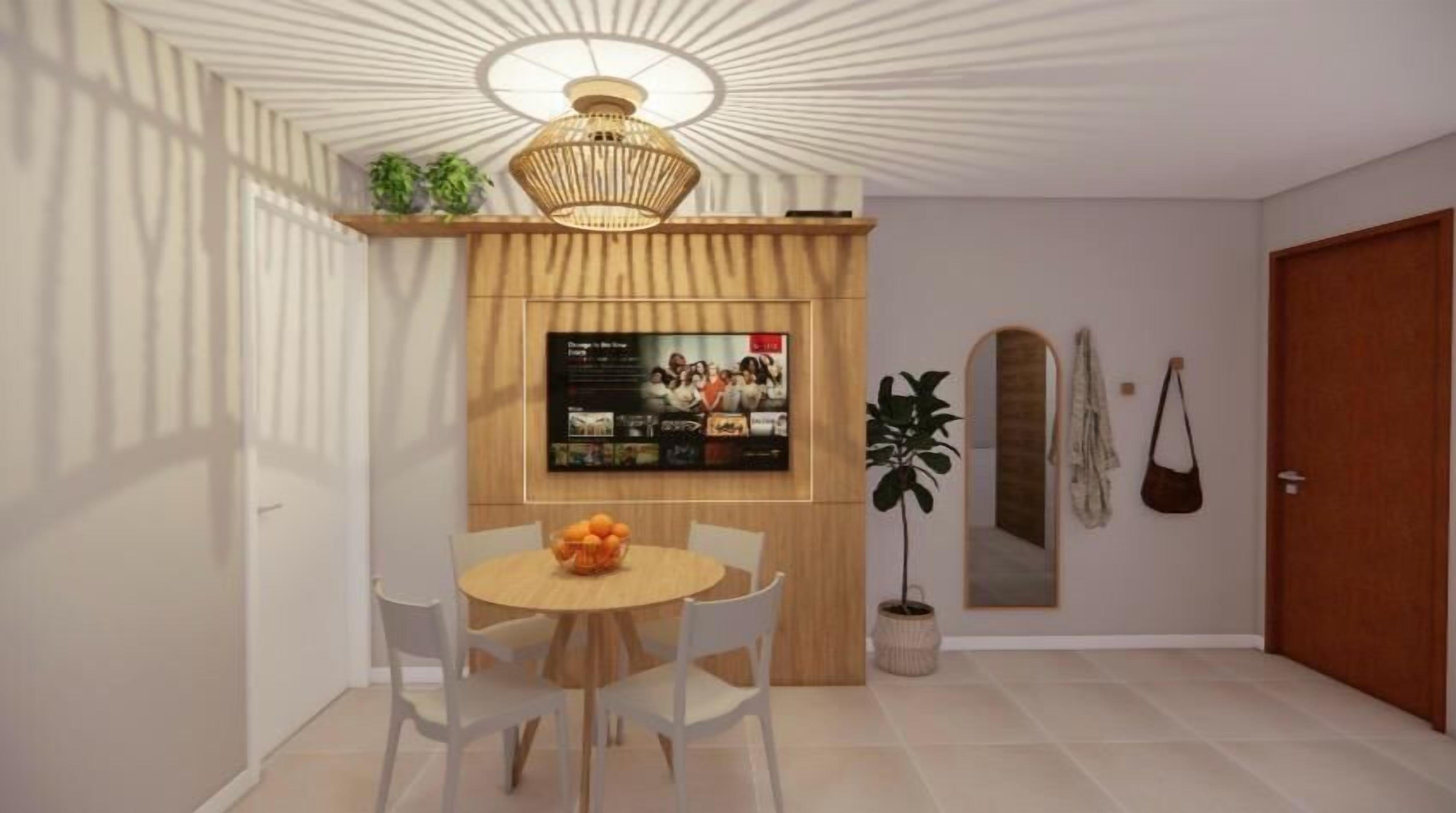 Um interior moderno com área de jantar, parede de destaque em madeira, um pôster, uma planta em vaso e uma porta.