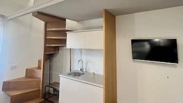 Quarto Duplo ou Twin Deluxe, varanda, Vista para a cidade | Edredões de penas, quartos insonorizados, ferro/tábua de engomar