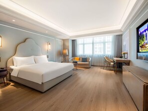 Roupa de alta qualidade, edredões de penas, minibar grátis 
