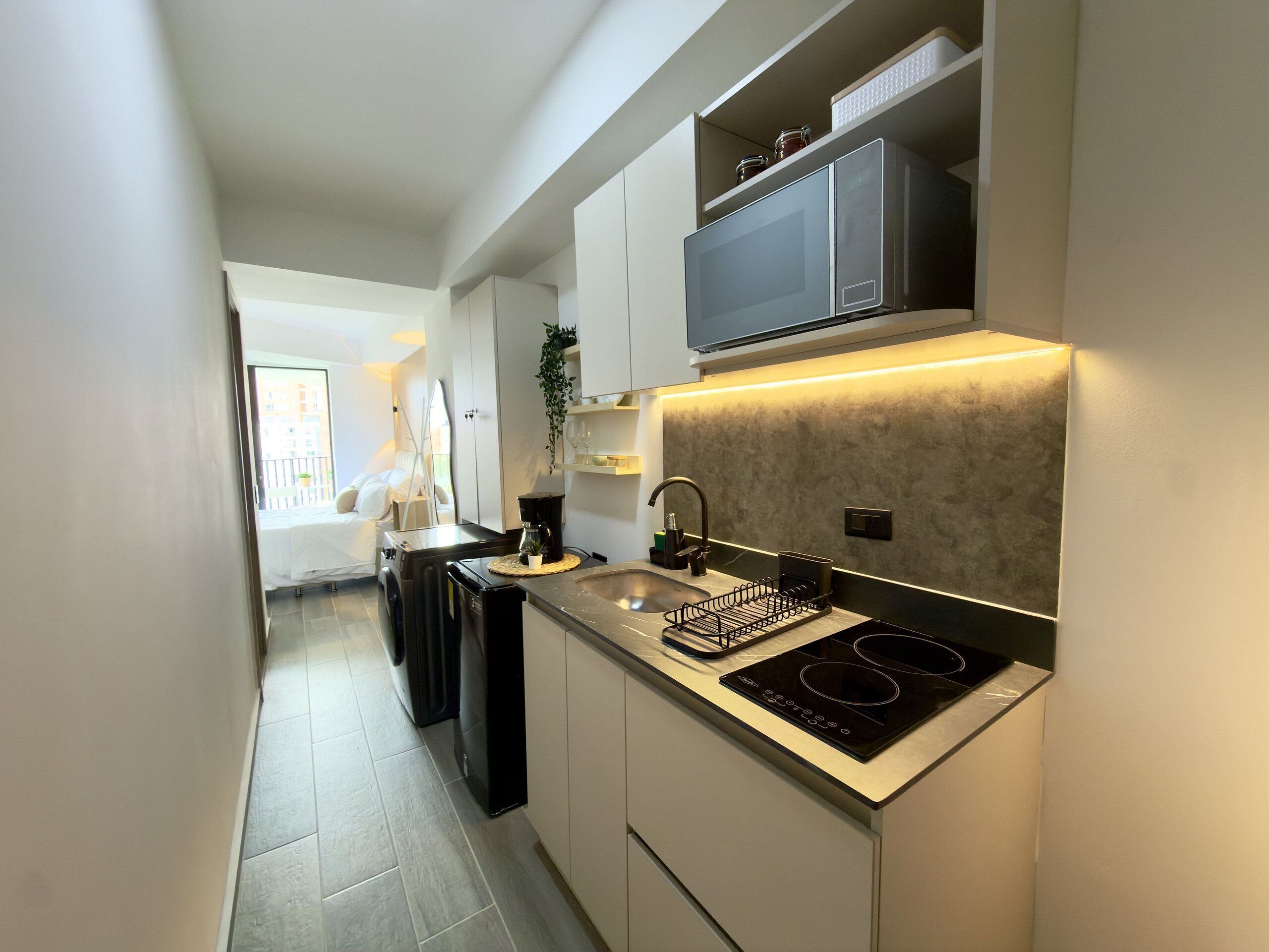 Apartamento conforto | Cozinha privada | Frigobar, micro-ondas, cooktop, lava-louças
