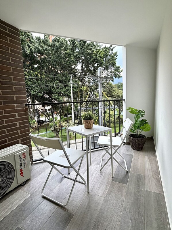 Apartamento Deluxe | Refeições ao ar livre