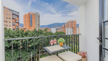 Apartamento Deluxe | Refeições ao ar livre