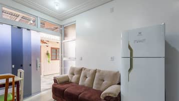 Apartamento Básico | Sala de estar | Smart TV de 32 polegadas com canais digitais