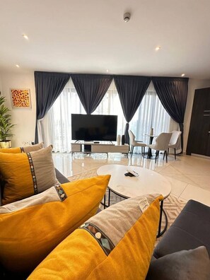 Apartamento superluxo, 1 quarto, para não fumantes | Área de estar