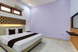 Suite Standard, 1 cama de casal | Wi-fi grátis, roupa de cama fornecida