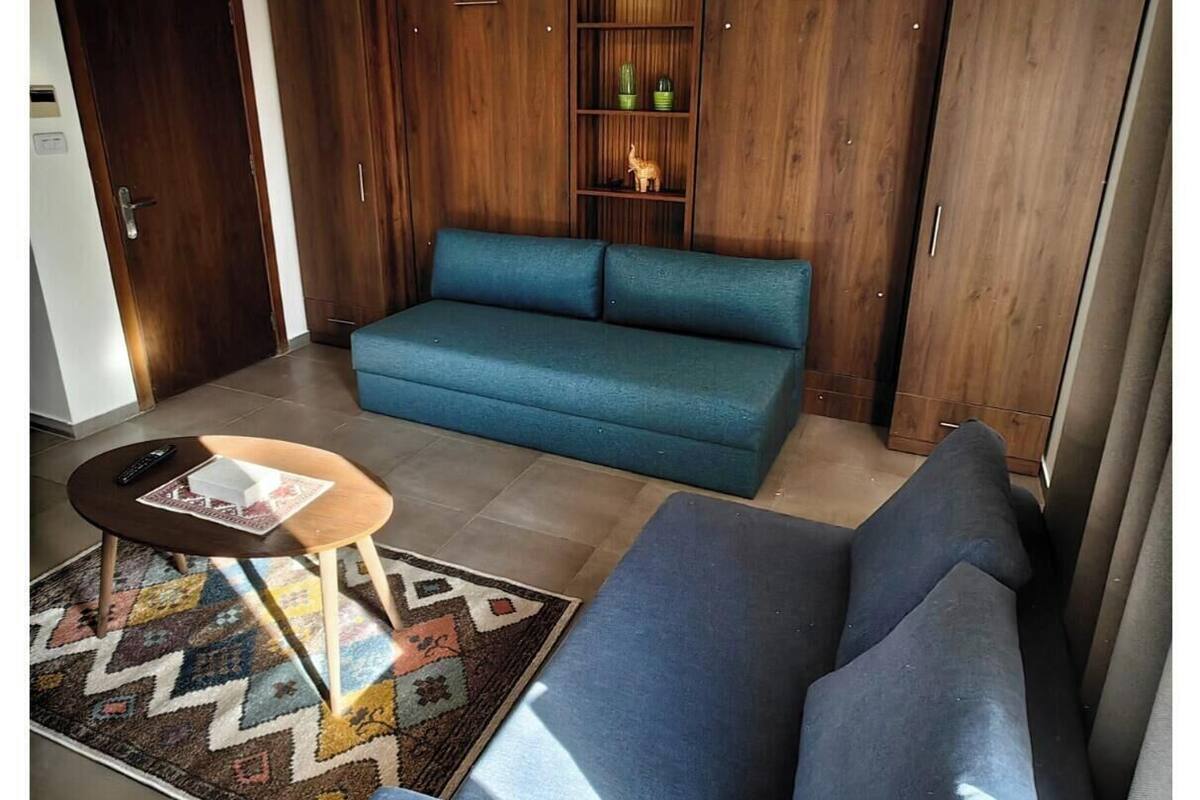 Suite Exclusiva | Sala de estar | Televisor