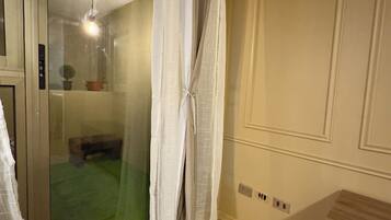 Apartamento, 1 cama de casal e sofá-cama, vista para o jardim | Terraço/pátio interior