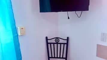 Estúdio Económico, vista para o jardim | Sala de estar