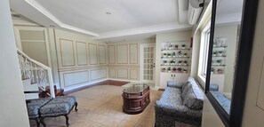 Quarto Familiar, 3 quartos, vista para o jardim | Sala de estar