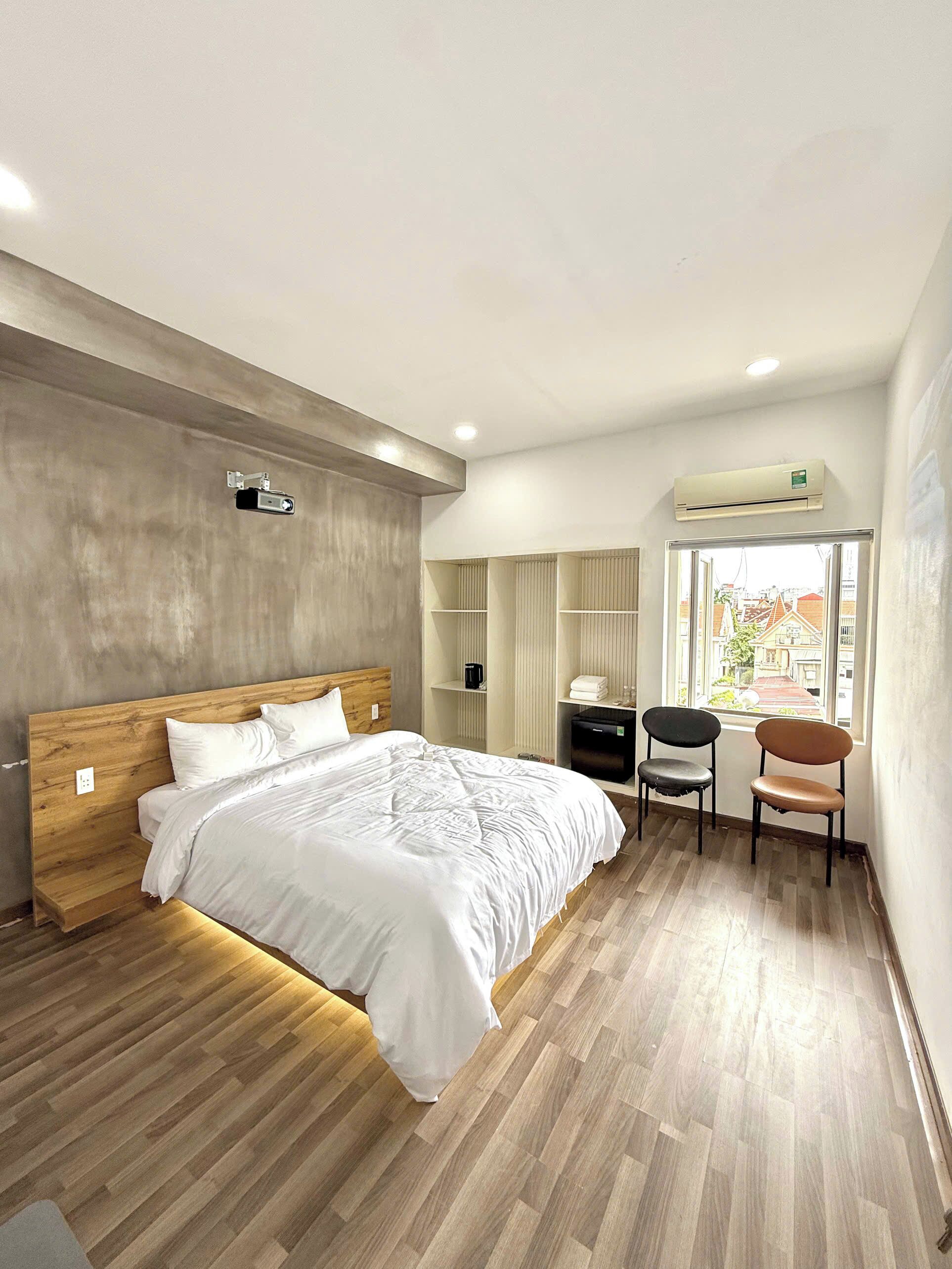 Suite-Estúdio Deluxe | Roupa de alta qualidade, camas de colchão Select Comfort, minibar 