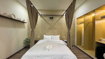 Suite-Estúdio Elite | Sala de estar | TV de ecrã plano