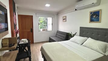 Apartamento Standard, vista para o parque | Ferro/tábua de engomar, Wi-fi grátis