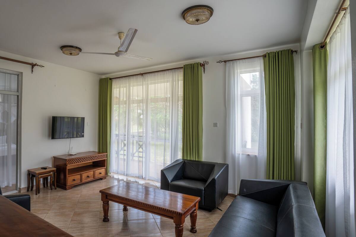 Villa Deluxe, vista para o jardim | Sala de estar