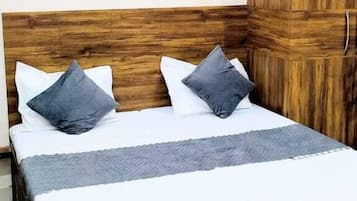 Quarto luxo, vista para a cidade | Área de estar