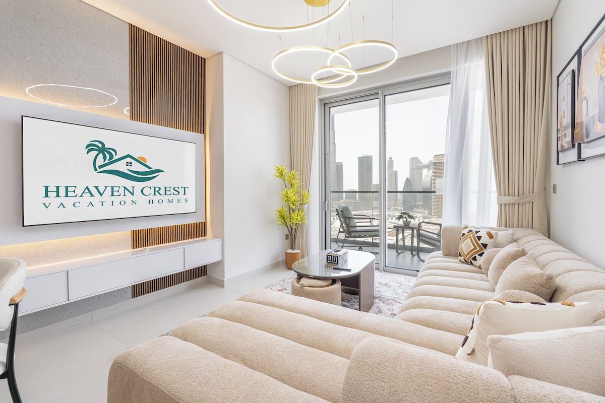 Apartamento superluxo, 2 quartos, para não fumantes, vista para a cidade | Área de estar | Smart TV 65 polegadas com canais digitais