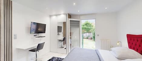 Quarto, vista para o jardim