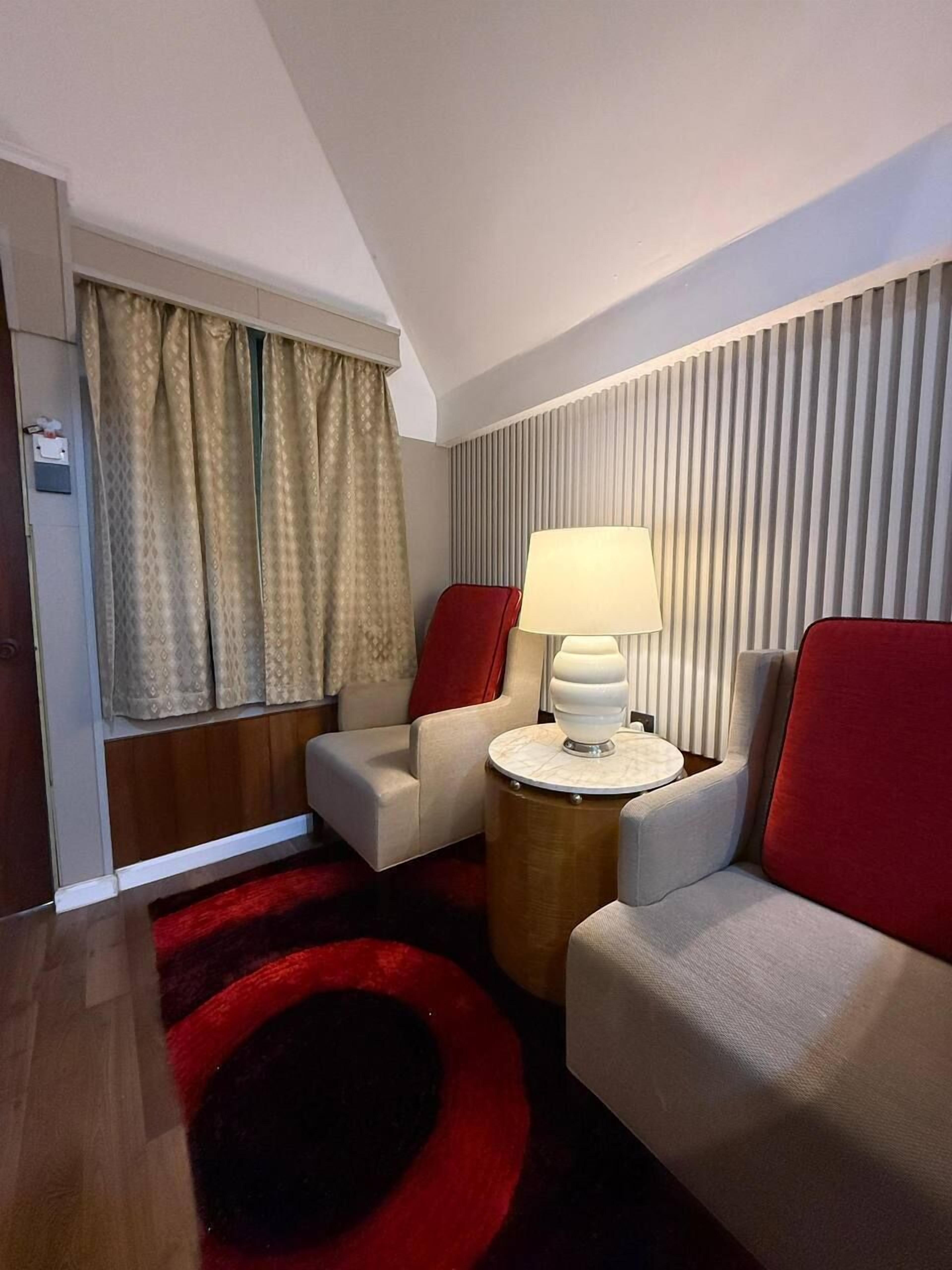 Quarto quádruplo | Área de estar