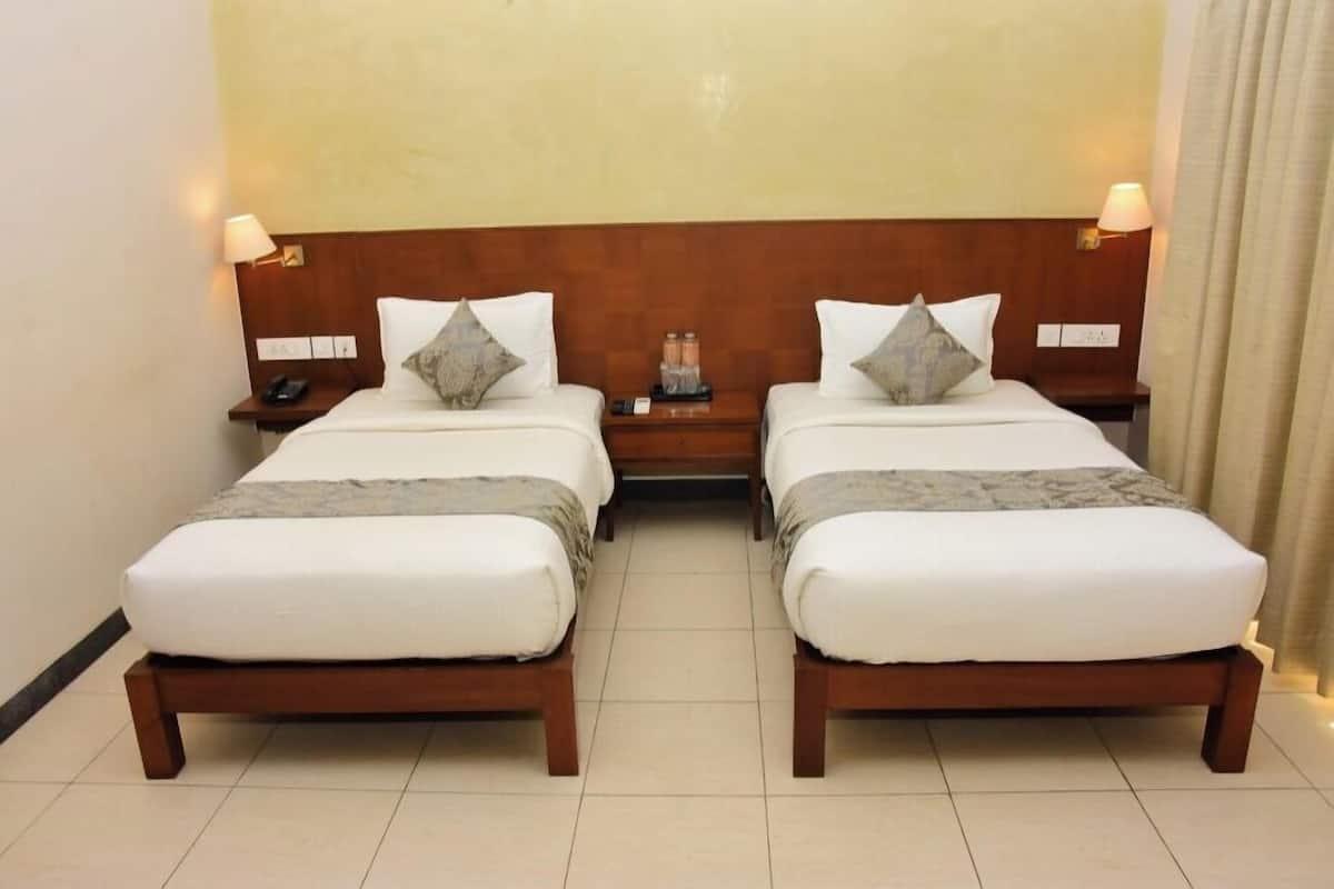 Quarto casal ou duplo premier, sacada, vista para o jardim | Wi-Fi de cortesia, acesso para cadeiras de rodas