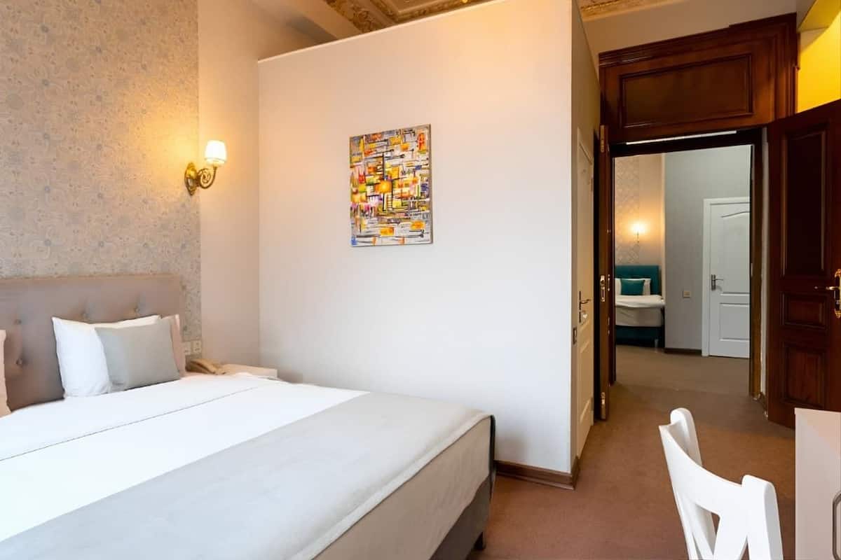 Quarto Familiar | Minibar, cofre no quarto, quartos insonorizados, ferro/tábua de engomar