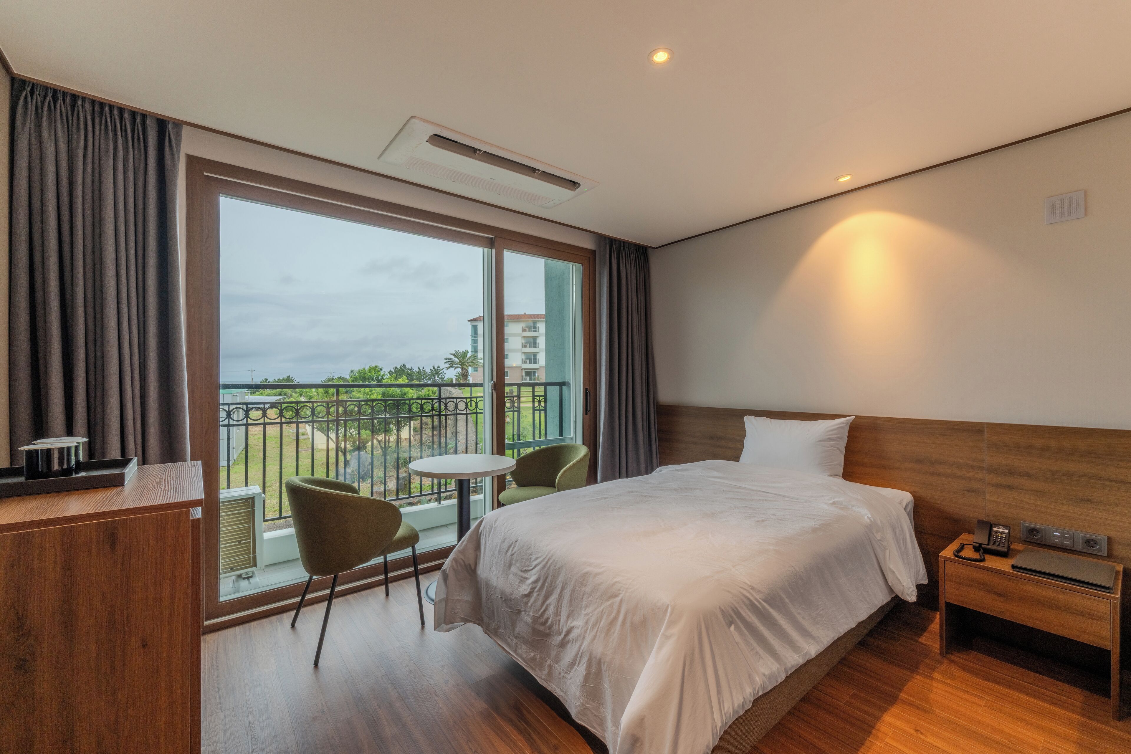 Quarto Twin Deluxe, vista para o jardim | Camas de colchão pillowtop, Wi-fi grátis, roupa de cama fornecida 