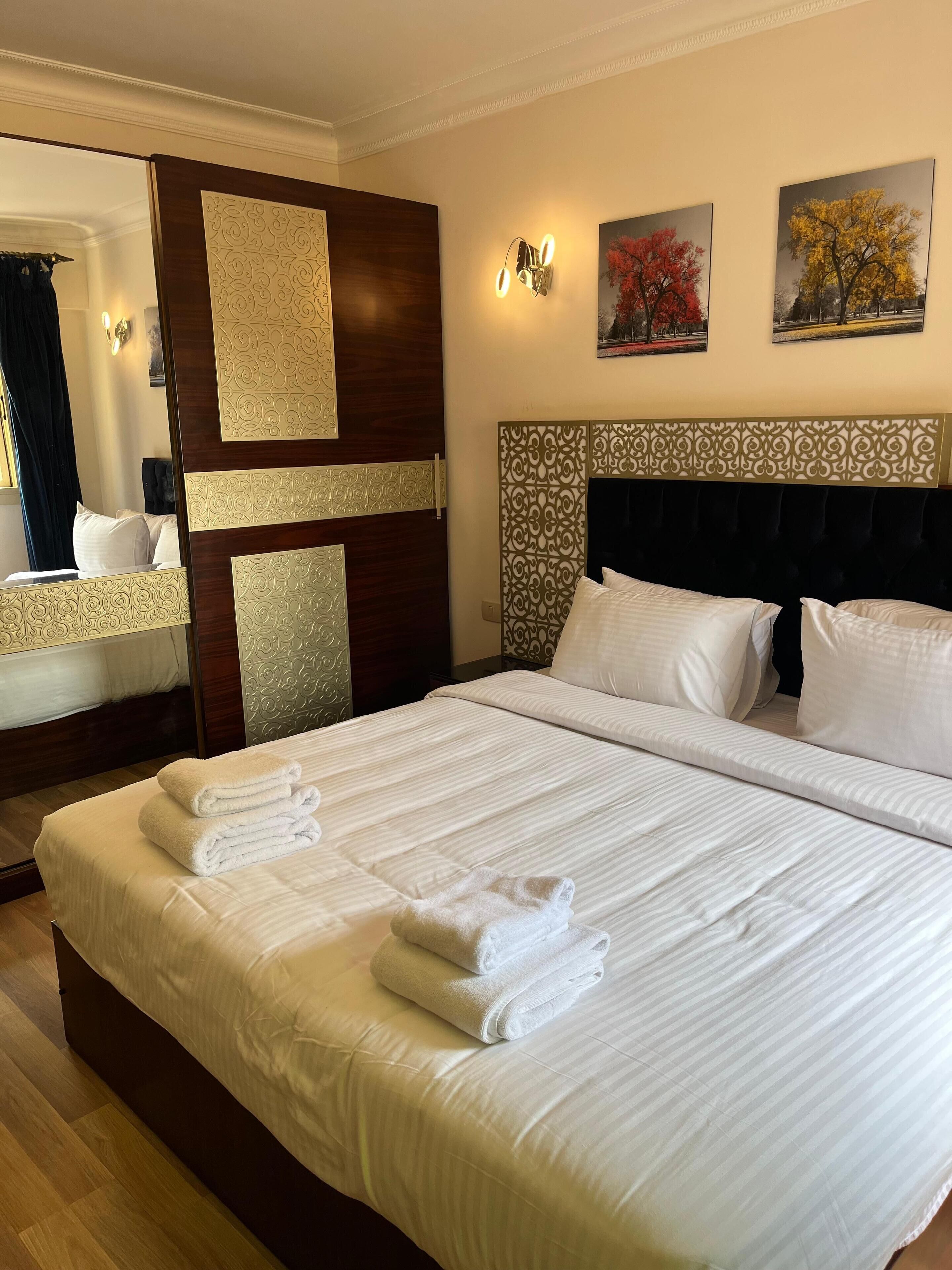 Apartamento superluxo, vista para a cidade | Ferros/tábuas de passar roupa, Wi-Fi de cortesia