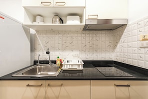 Apartamento, sacada | Cozinha privada