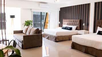 Suíte premium, vista para a cidade | Berço de viagem, Wi-Fi de cortesia, roupa de cama