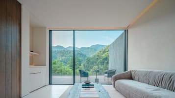 Suite Premier, vista para a colina | Sala de estar