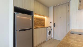 Apartamento, varanda | Cozinha privada