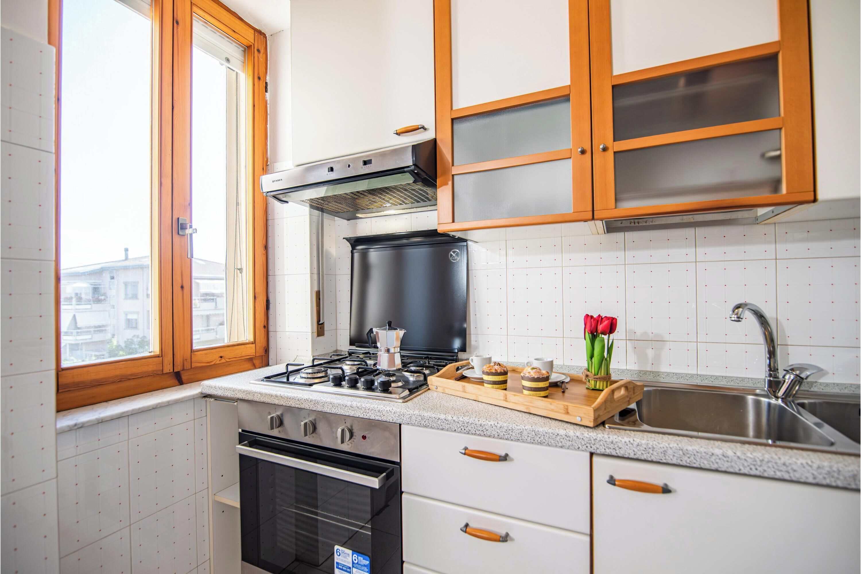 Apartamento família, vários quartos (Casa Gialla) | Cozinha privada | Geladeira, fogão, cooktop, lava-louças