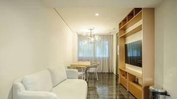 Apartamento | Sala de estar | Smart TV de 32 polegadas com canais digitais