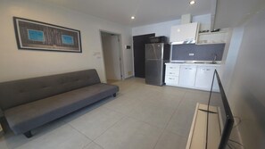 Apartamento, varanda, Vista para a cidade | Sala de estar