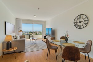 Apartamento Comfort, Vista para a cidade | Sala de estar