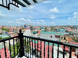 Quarto Duplo Deluxe, varanda, Vista para a cidade | Varanda